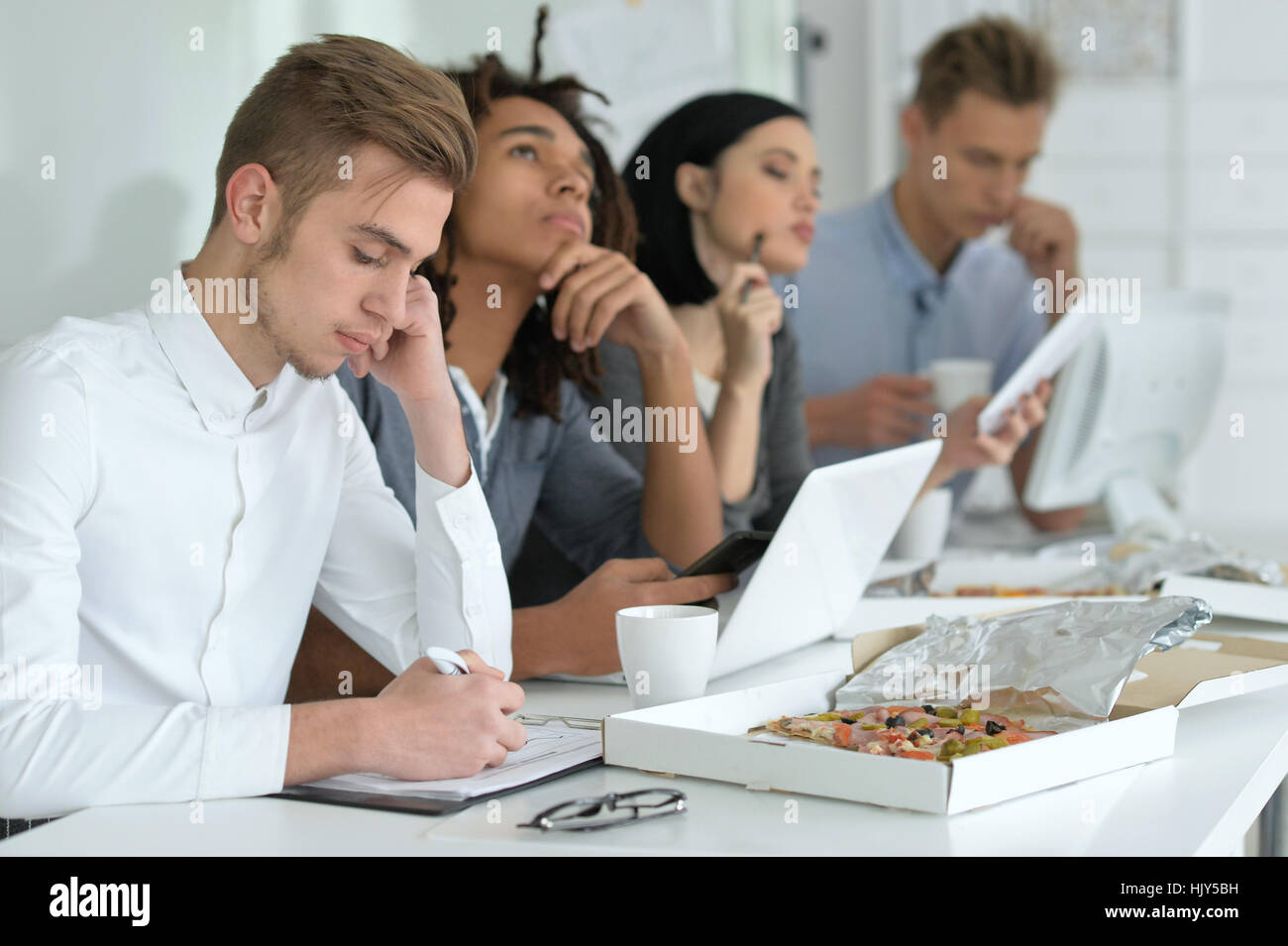 young people colleagues at office Stock Photo - Alamy