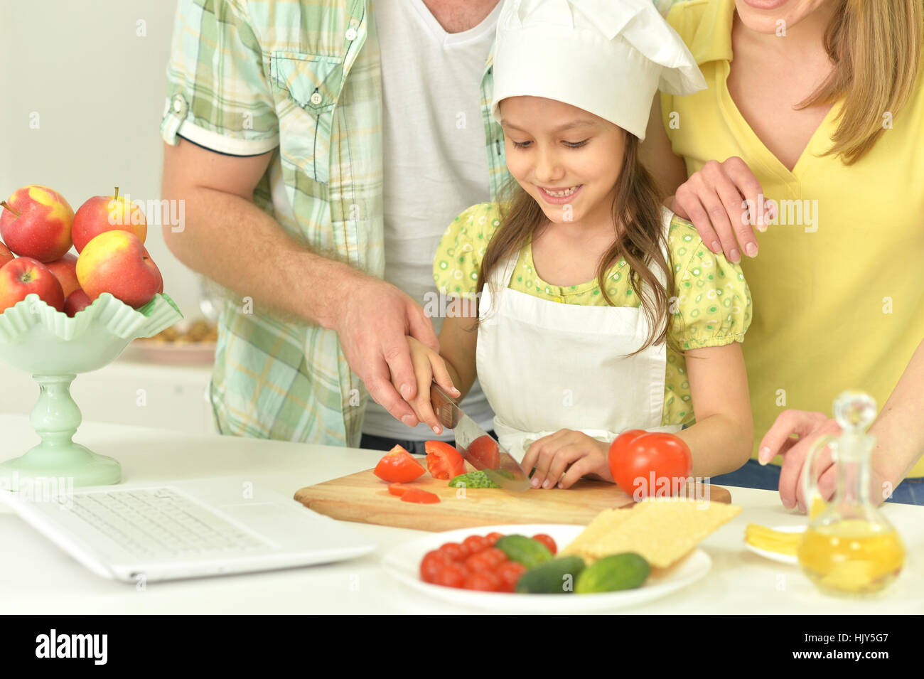family cooking soup Stock Photo - Alamy