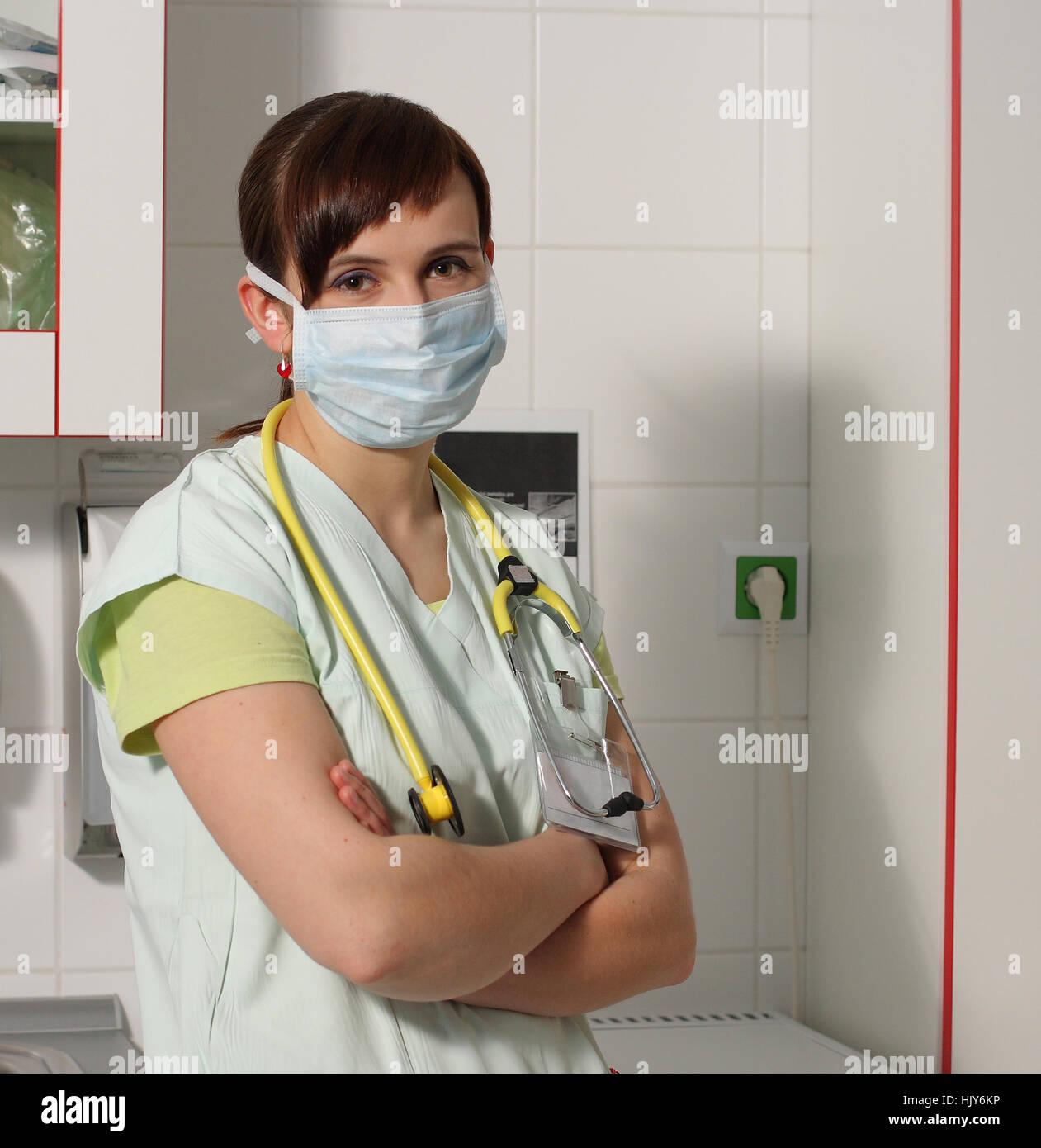 Portrait female nurse in ICU in the green uniform Stock Photo - Alamy