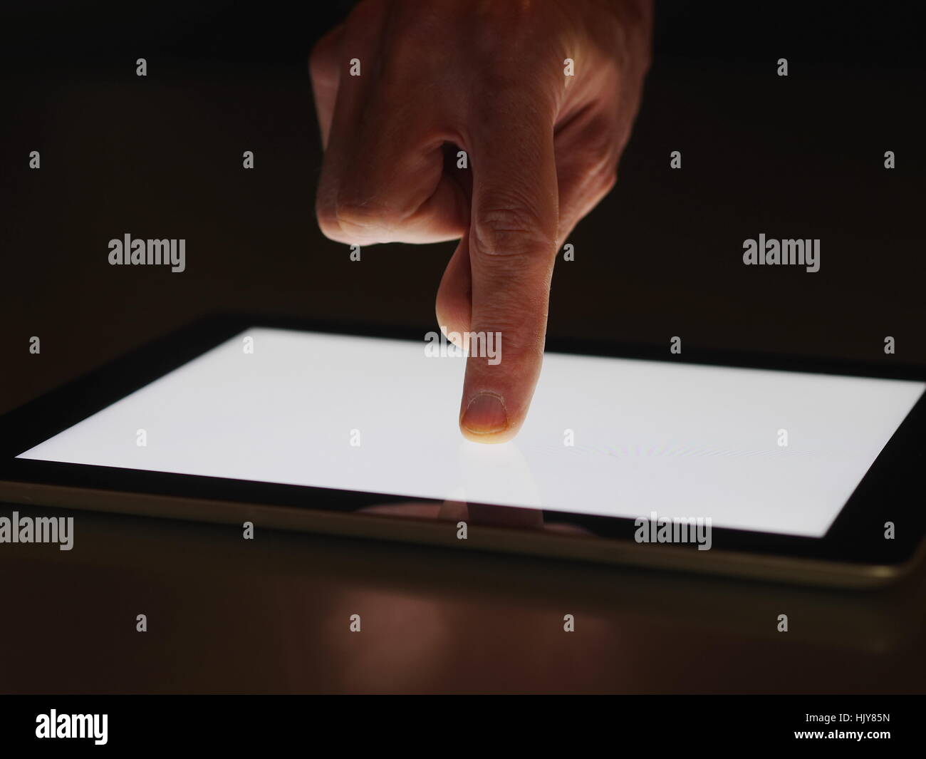 Closeup hand touching tablet screen hi-res stock photography and images ...