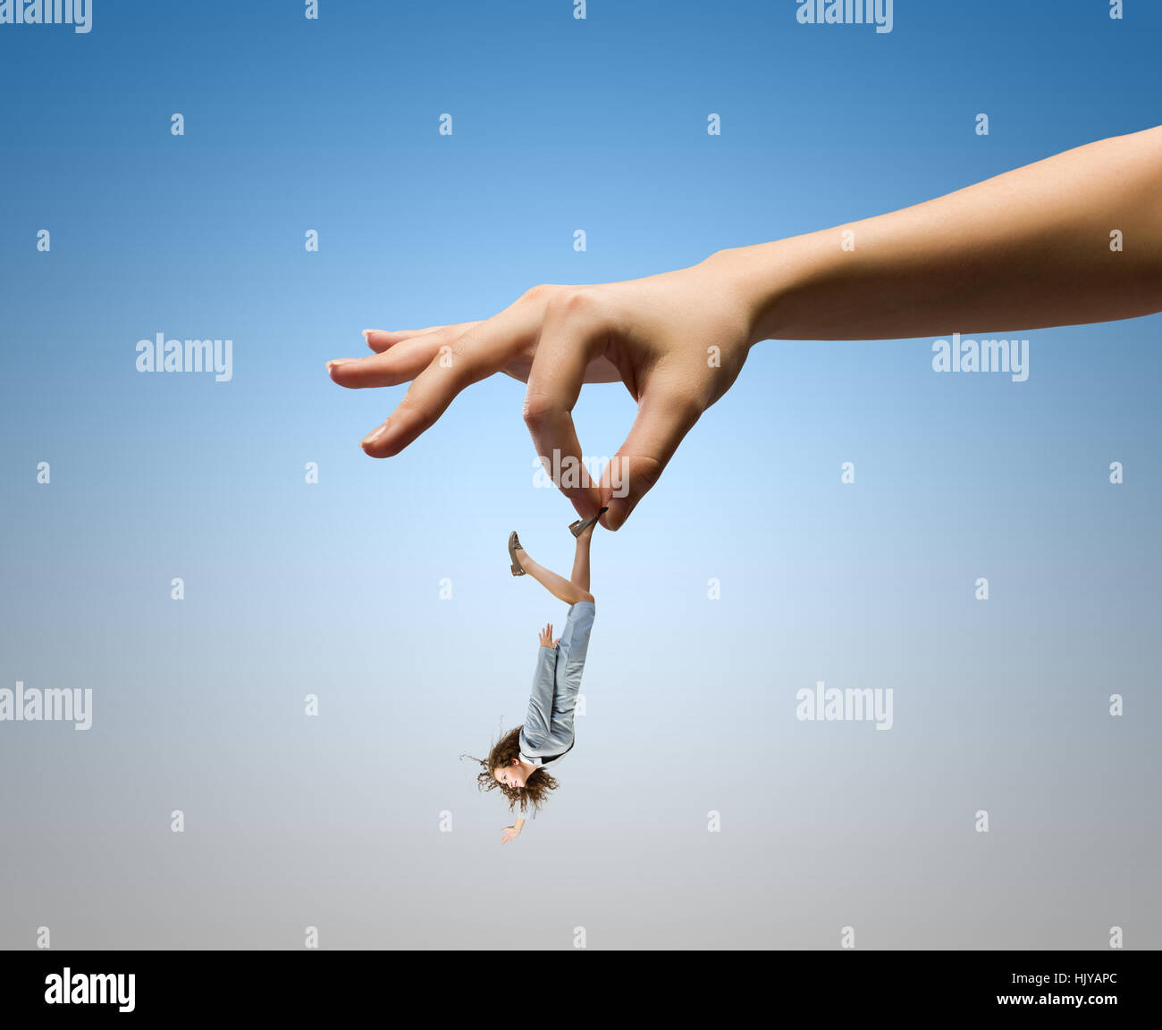 Giant human hand holding miniature hi-res stock photography and images ...