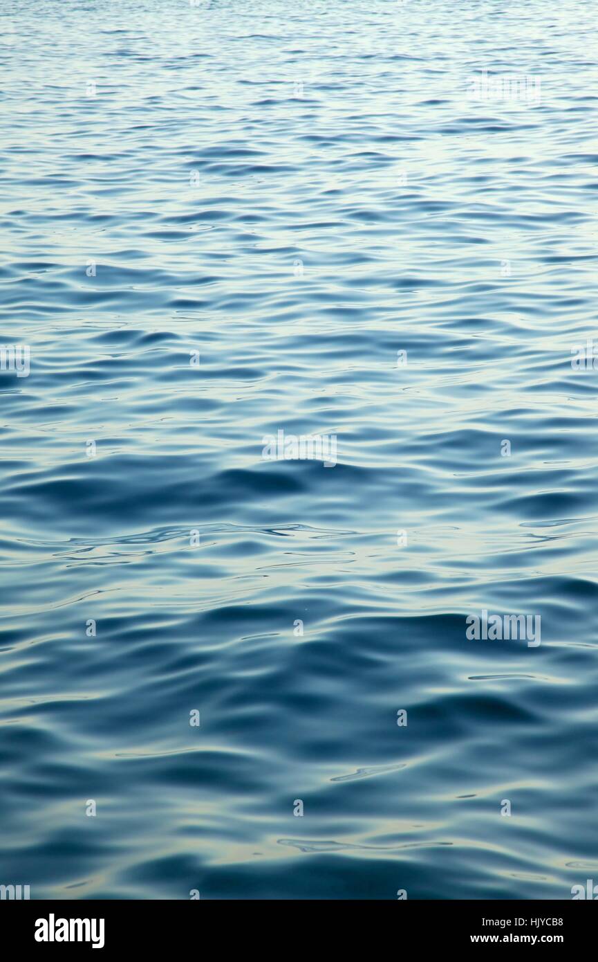 Rippling blue water surface Stock Photo - Alamy