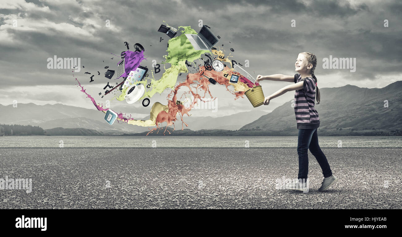 Cute girl with bucket and colorful springs coming out Stock Photo - Alamy