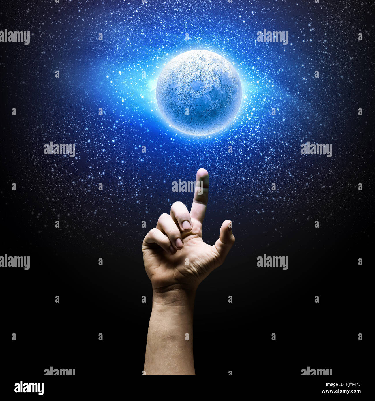 Hand pointing star in hi-res stock photography and images - Alamy