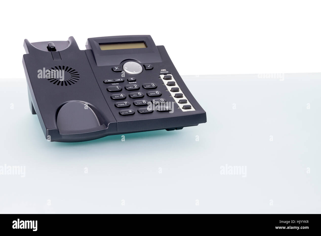 voip phone on glass desk Stock Photo - Alamy