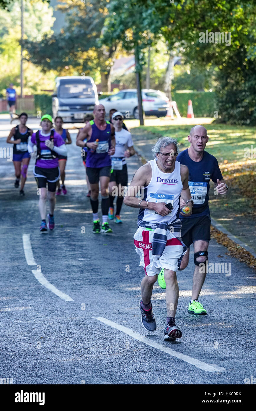 A group of runners in the Chester Marathon Stock Photo - Alamy
