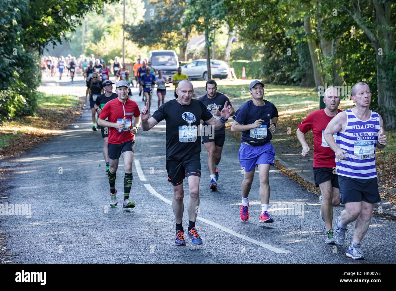 A group of runners in the Chester Marathon Stock Photo - Alamy