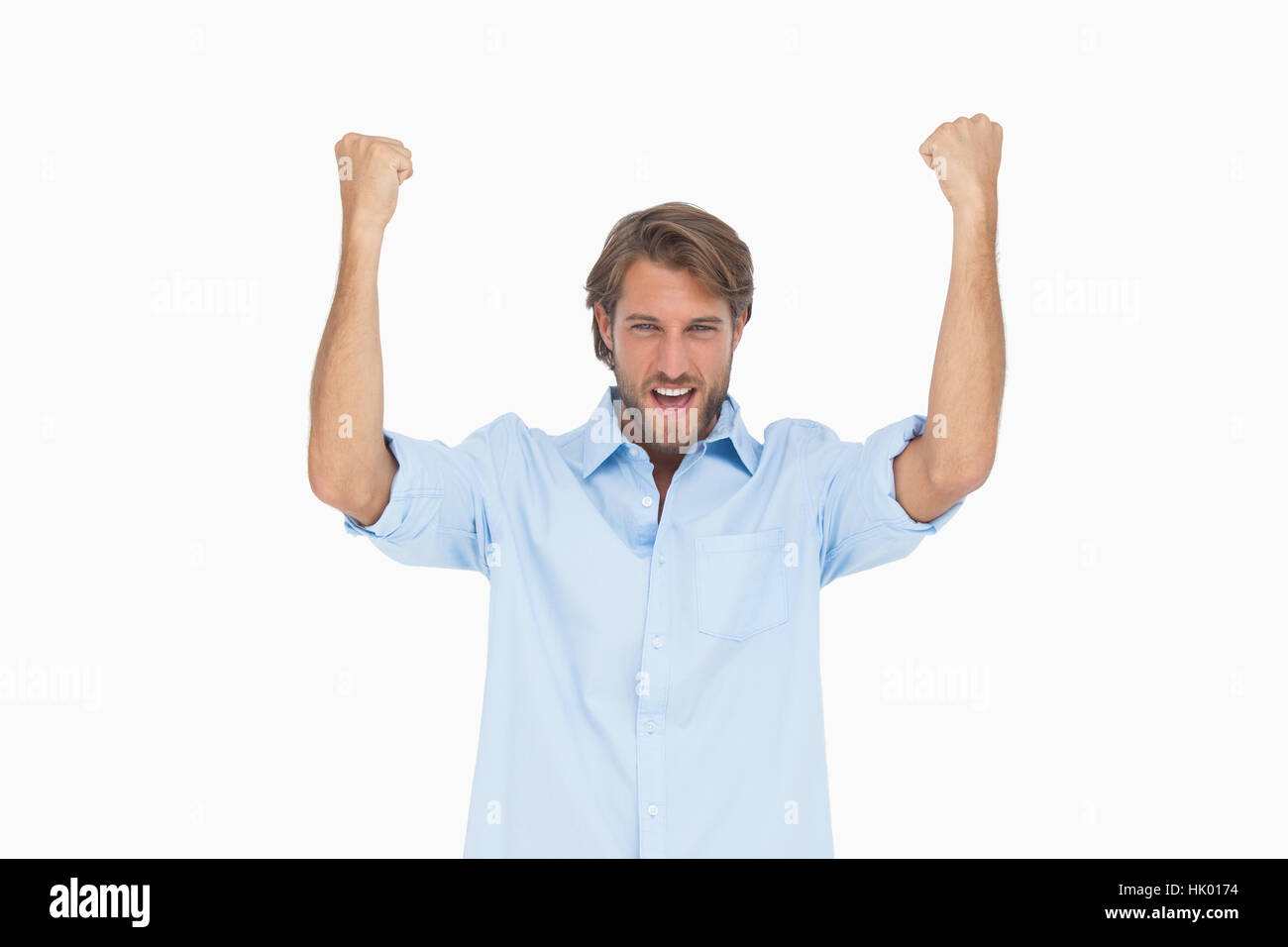 Happy man in shirt cheering on white background Stock Photo - Alamy
