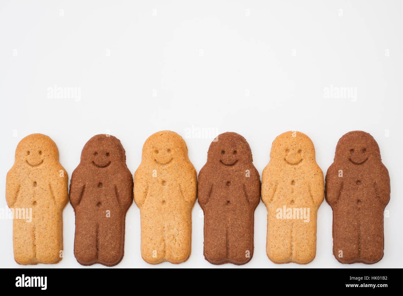 Gingerbread men holding hands hi-res stock photography and images - Alamy