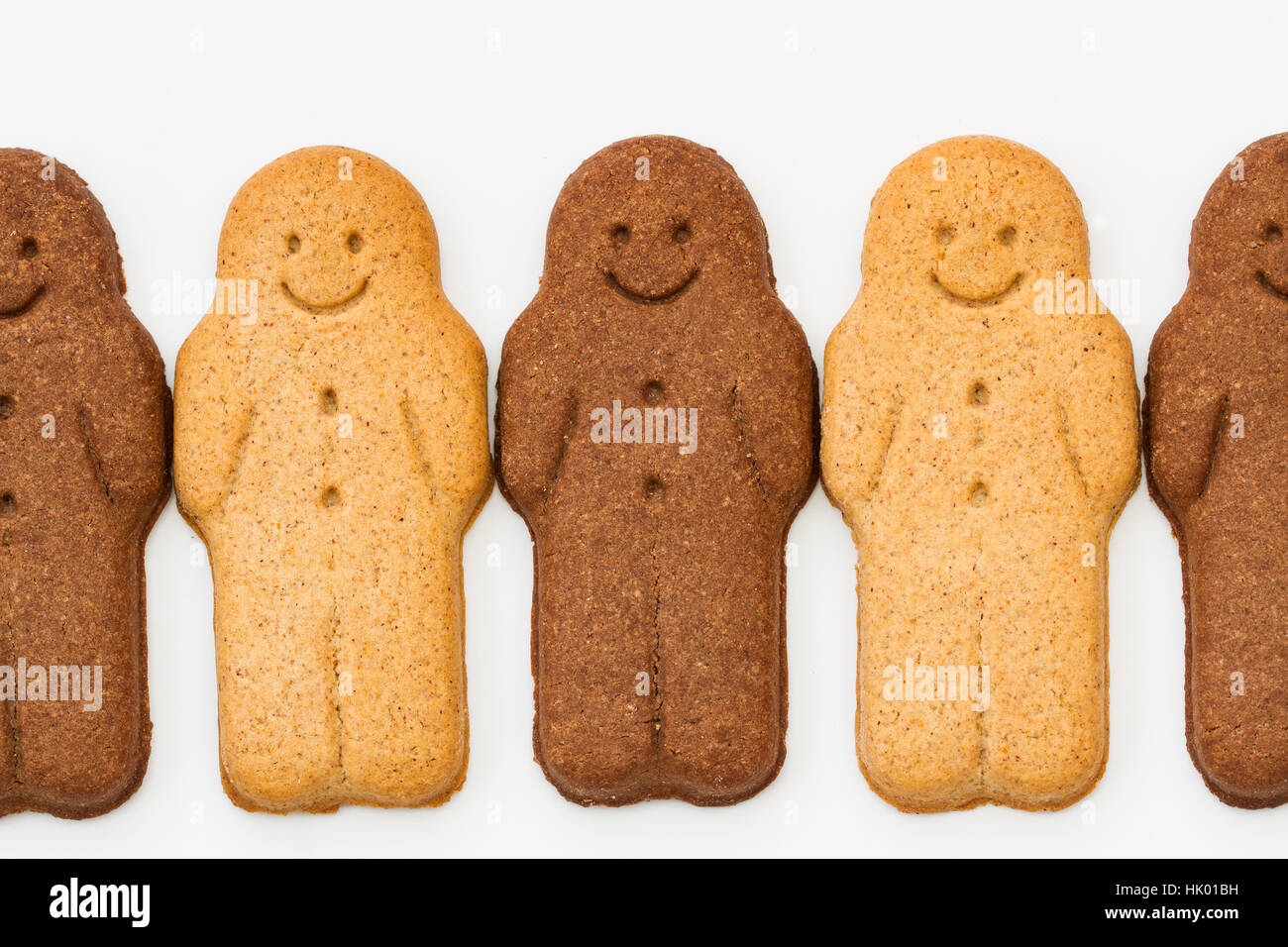 Gingerbread men holding hands hi-res stock photography and images - Alamy