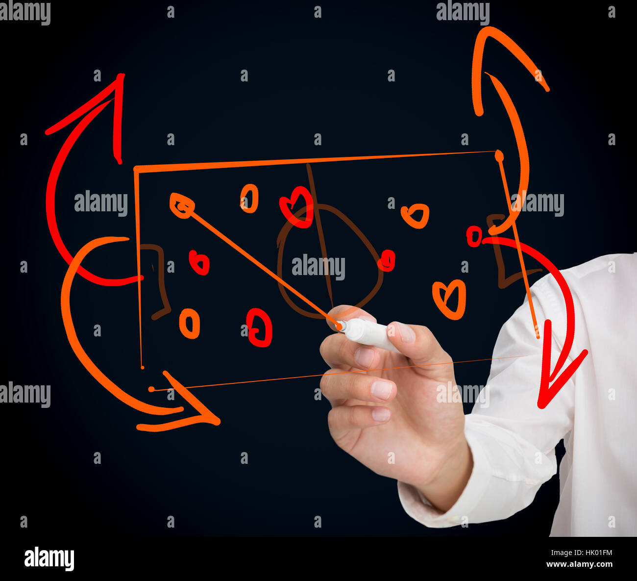 Woman developing a tactical sport strategy on black background Stock ...