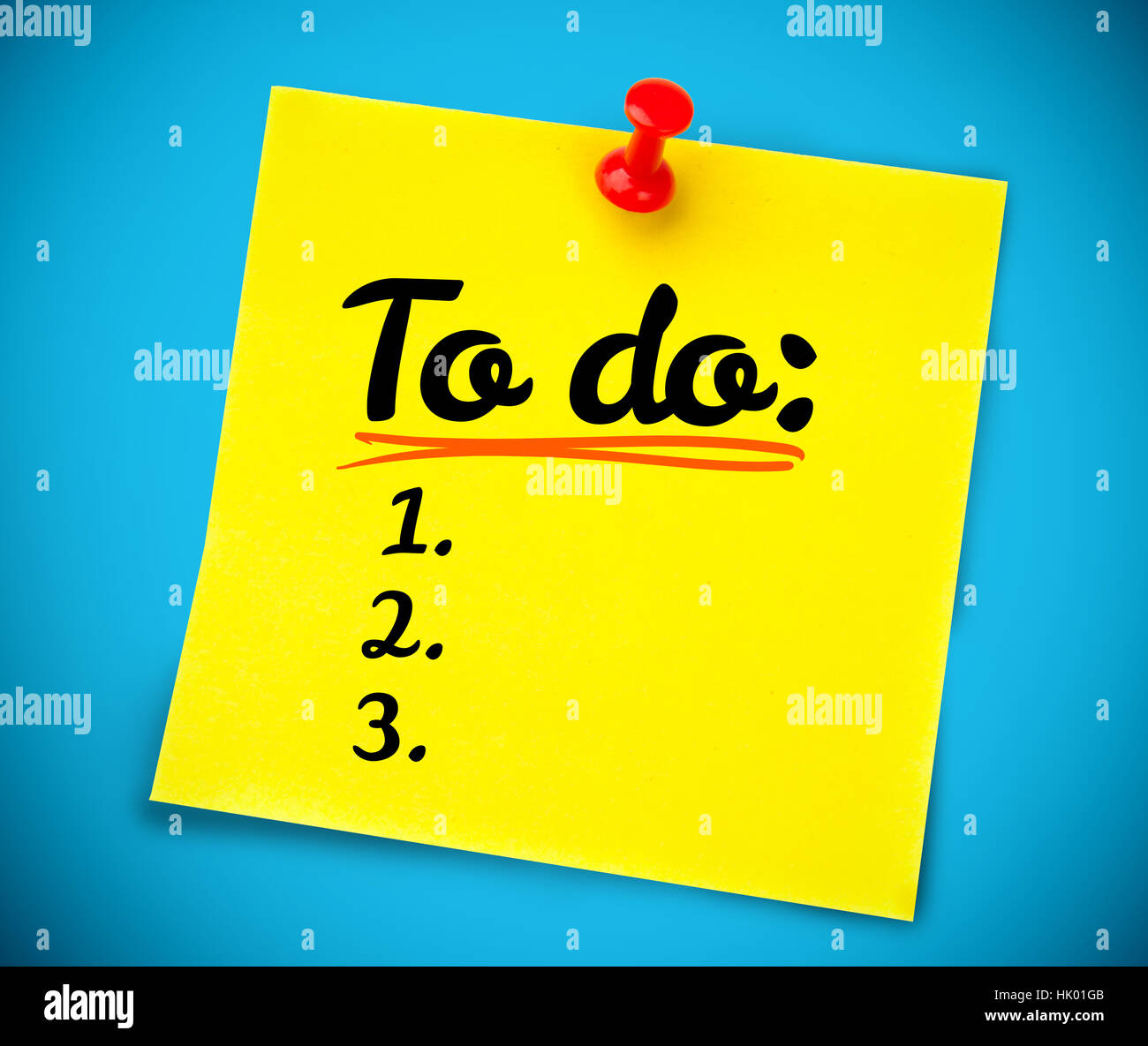 Yellow post it with a to do list written on it on a blue wall Stock ...