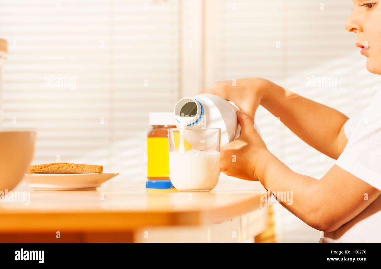 Kid Pouring Milk High Resolution Stock Photography and Images - Alamy