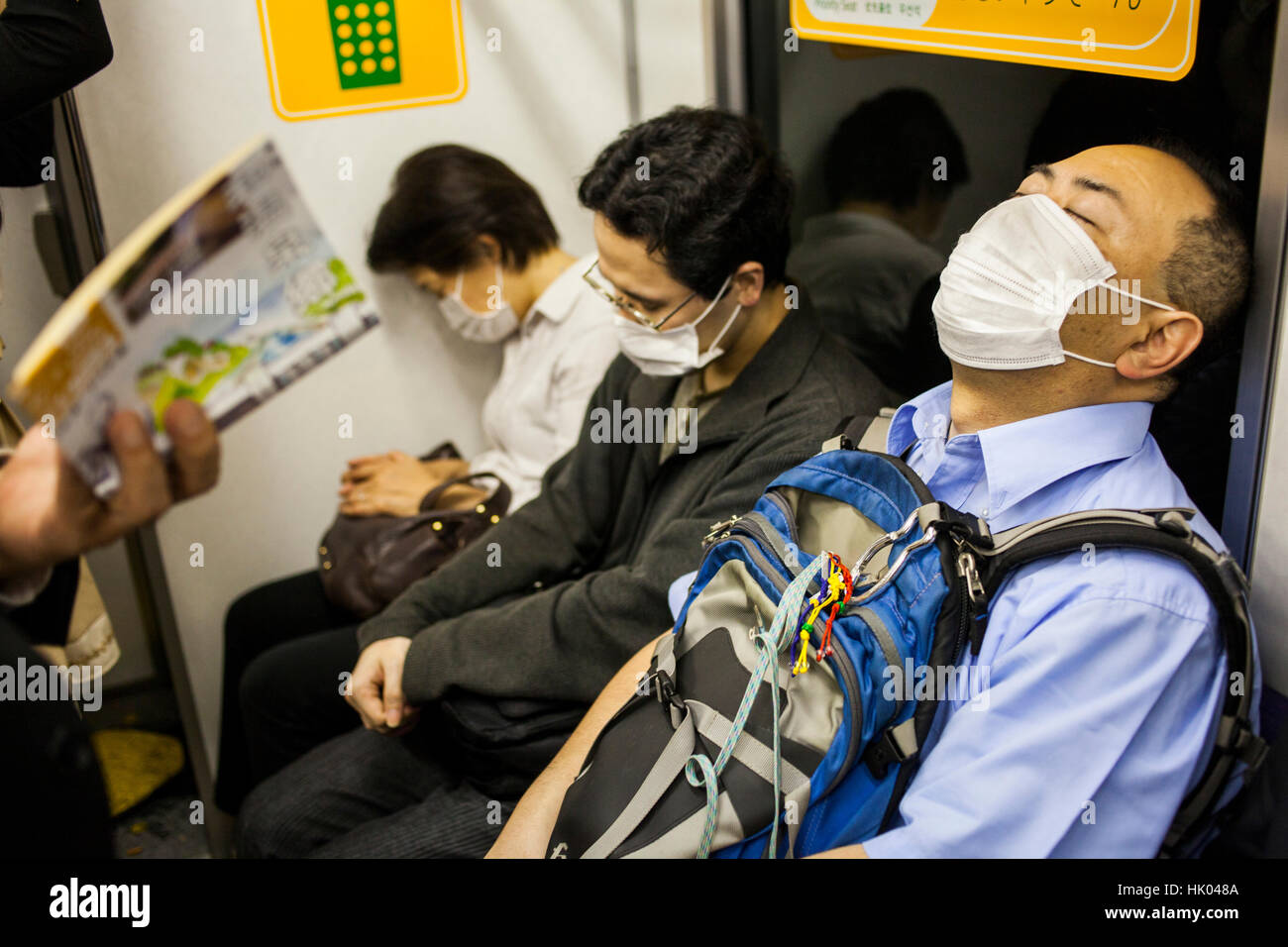 Karoshi, Passengers sleeping in Keio line. Tokyo. Japan Stock Photo - Alamy