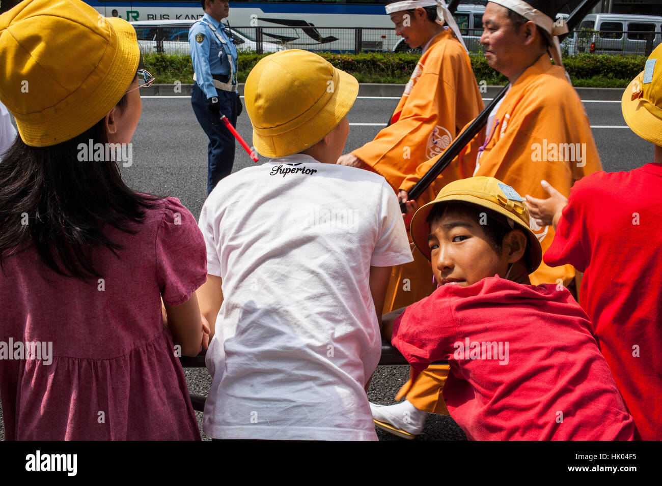 children looking the Sanno Matsuri parade, near the Ichigaya station ...