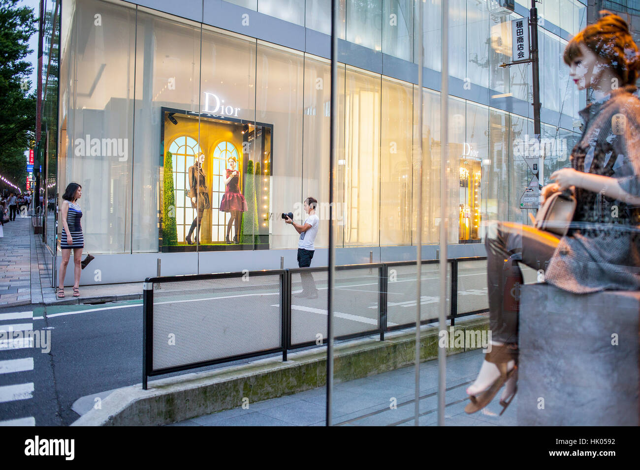 Couple,taking pictures.Nex to Dior Store, by SANAA (Sejima y Nishikawa ...