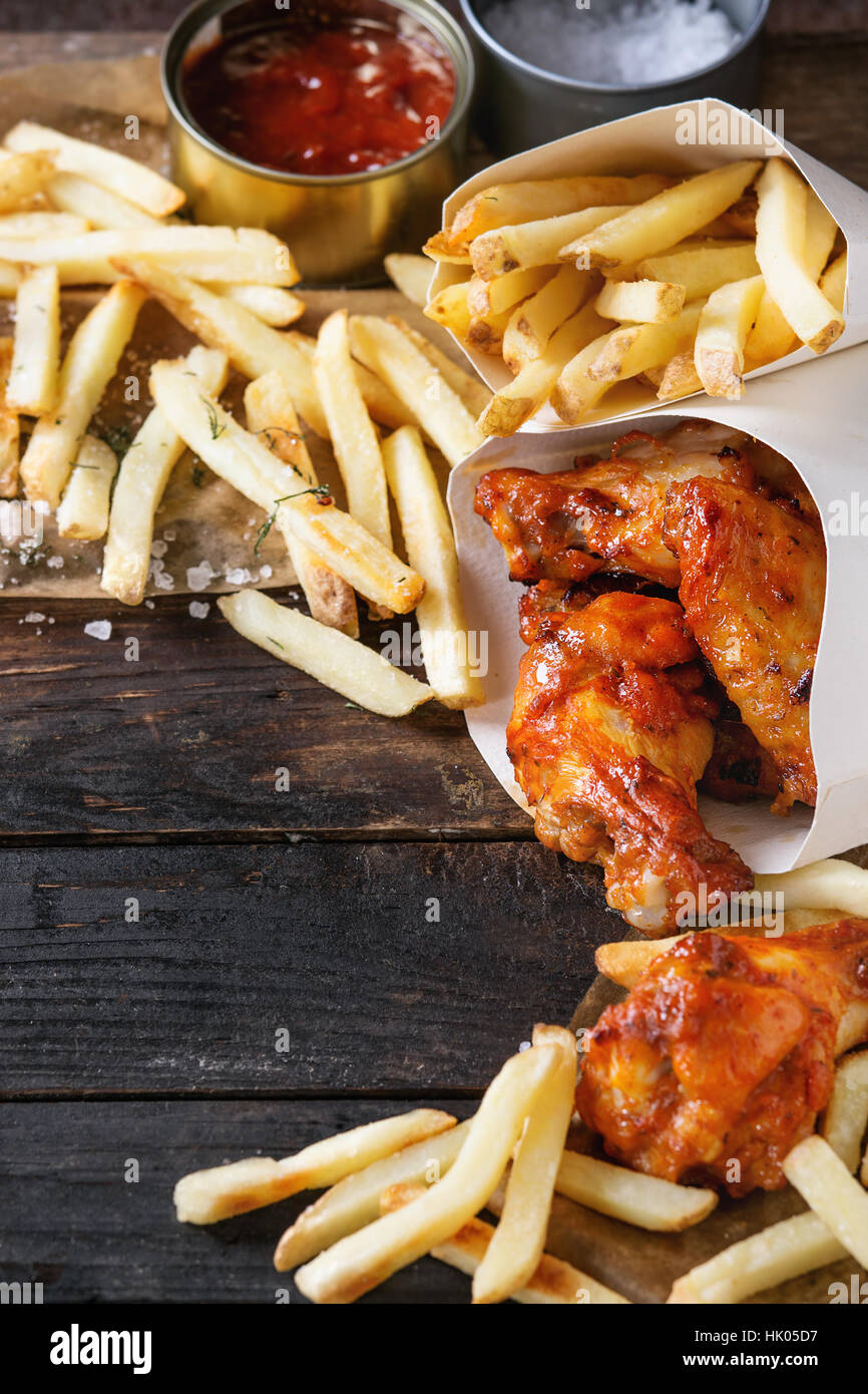 Fried chicken legs with french fries Stock Photo - Alamy