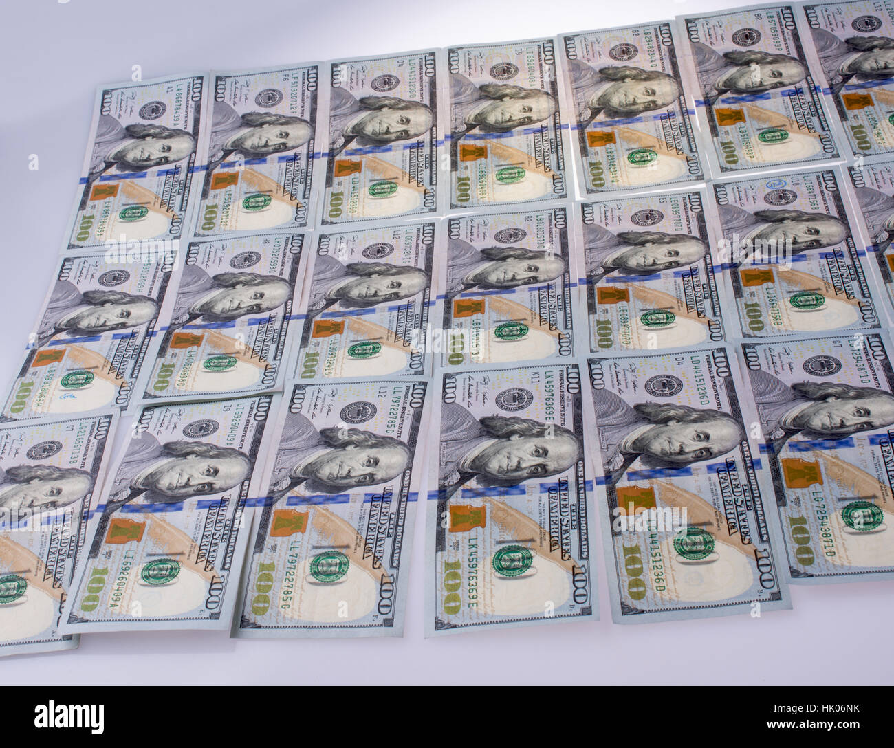 American 100 dollar banknotes made of paper placed on white background ...