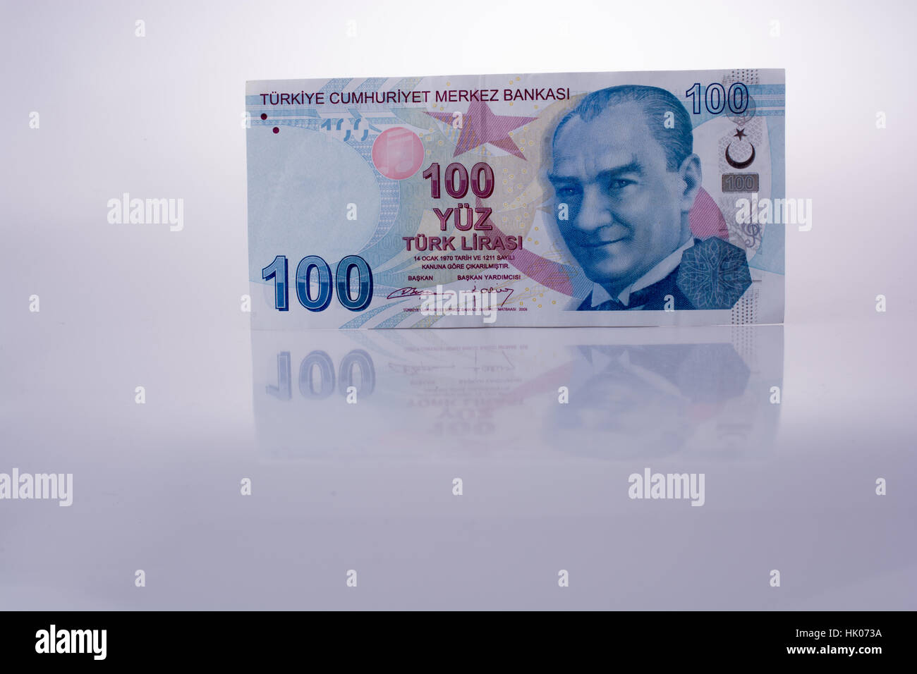 Turksh Lira banknotes of 100 Lira on white background Stock Photo - Alamy