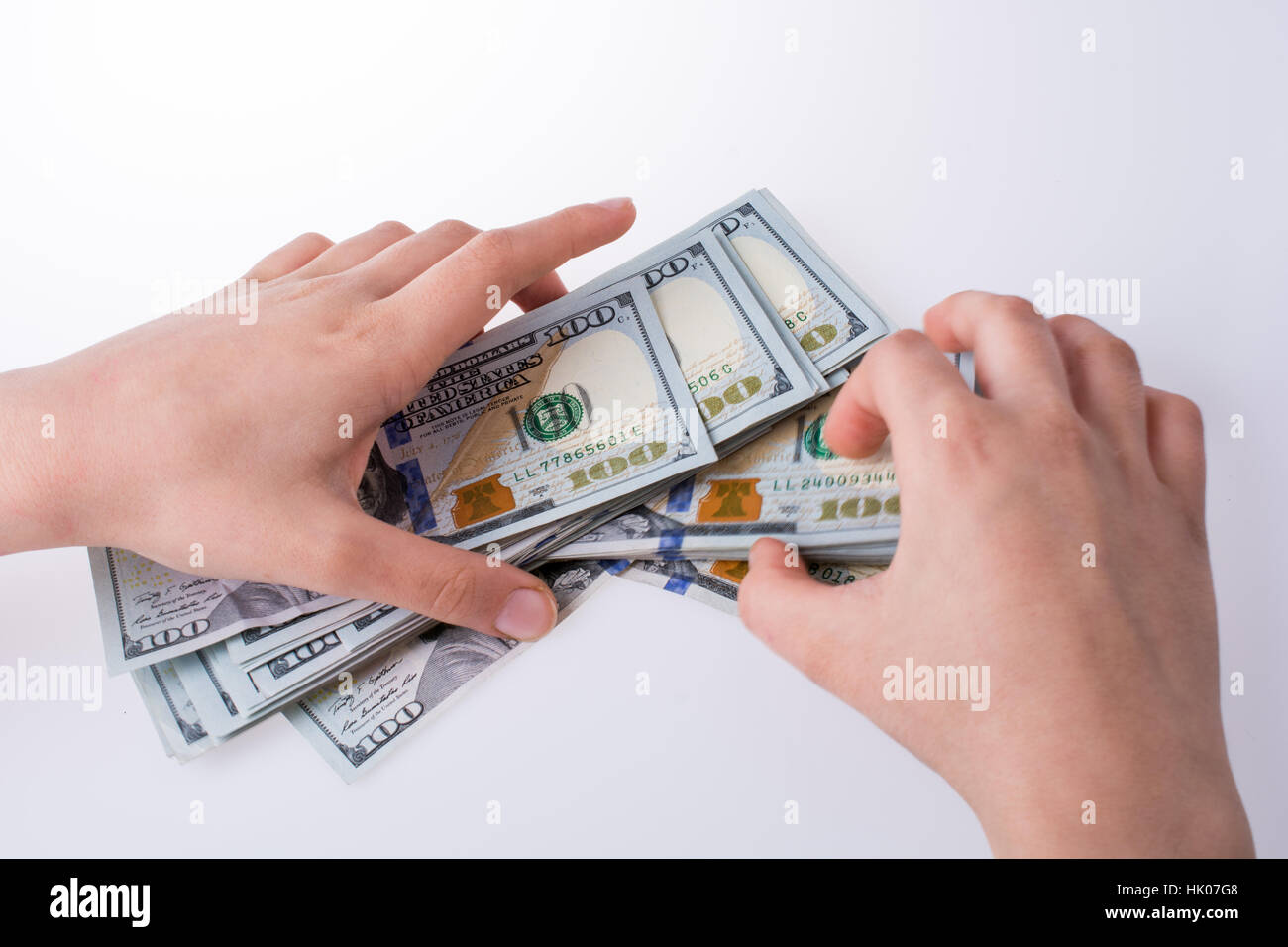 Human hand holding American dollar bill as money isolated on white ...