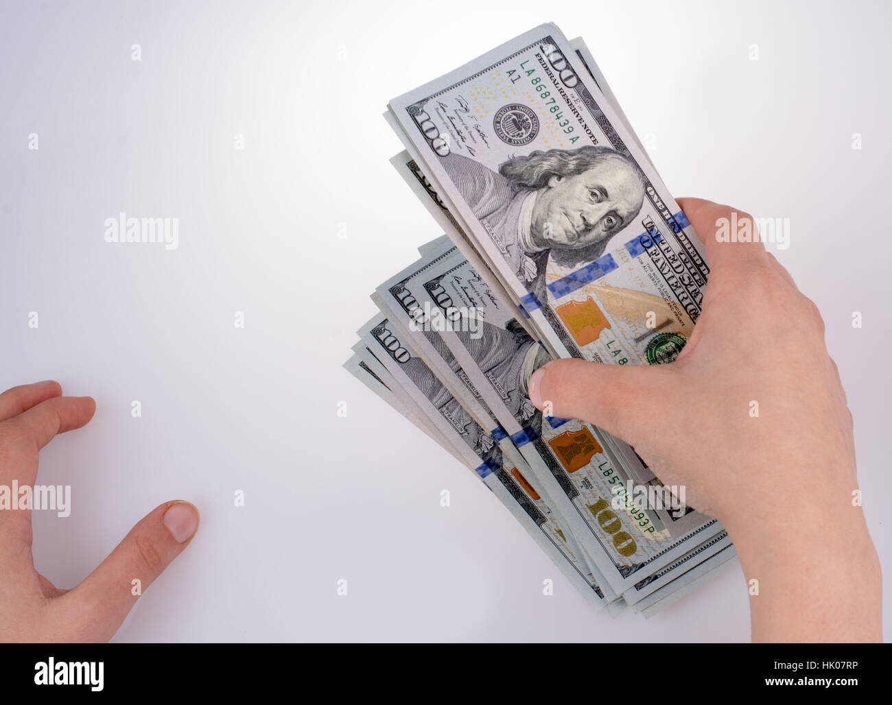 Human hand holding American dollar bill as money isolated on white ...