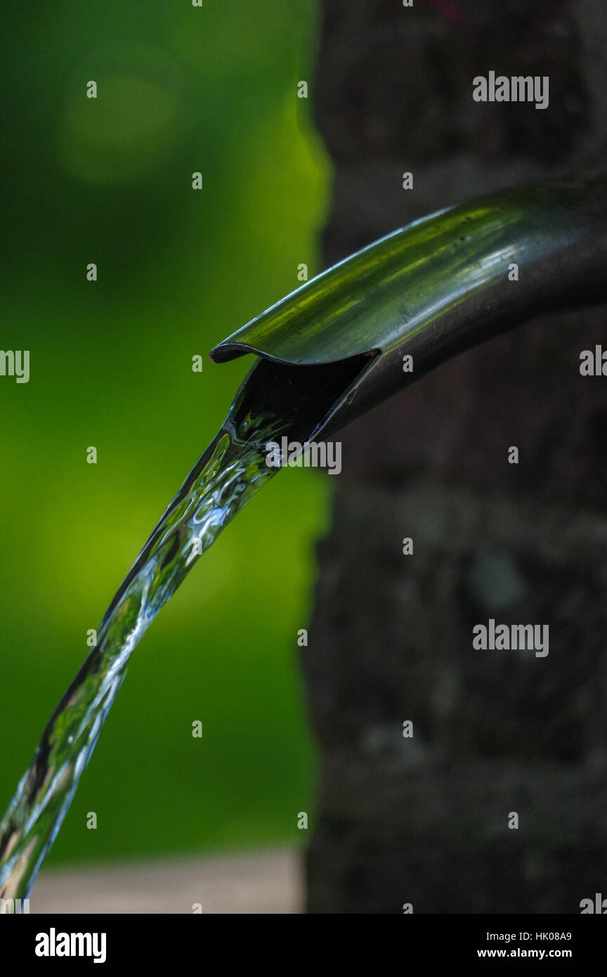 Water flowing from spigot hi-res stock photography and images - Alamy