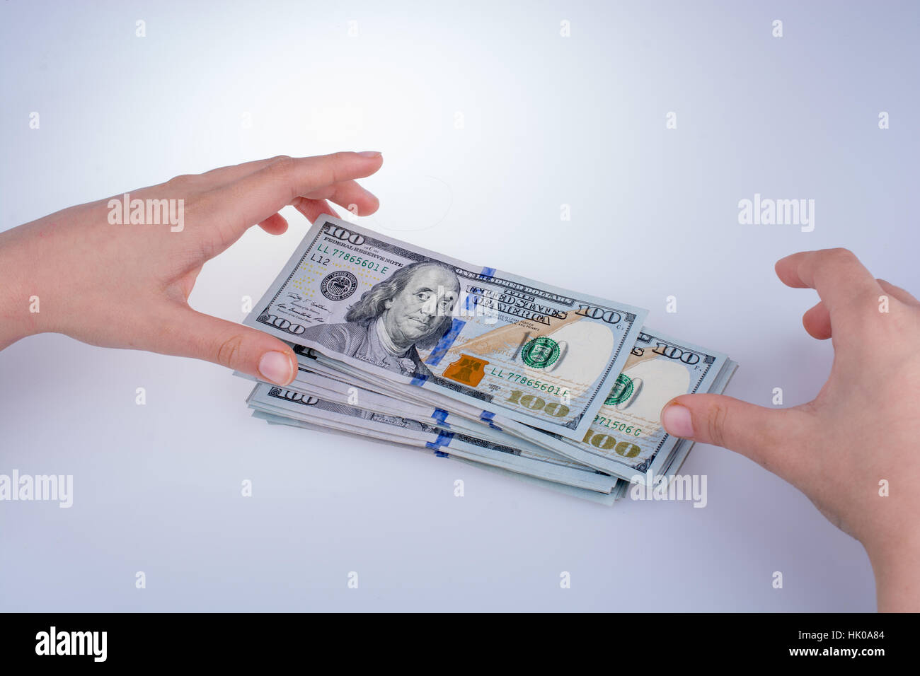 Human hand holding American dollar bill as money isolated on white ...