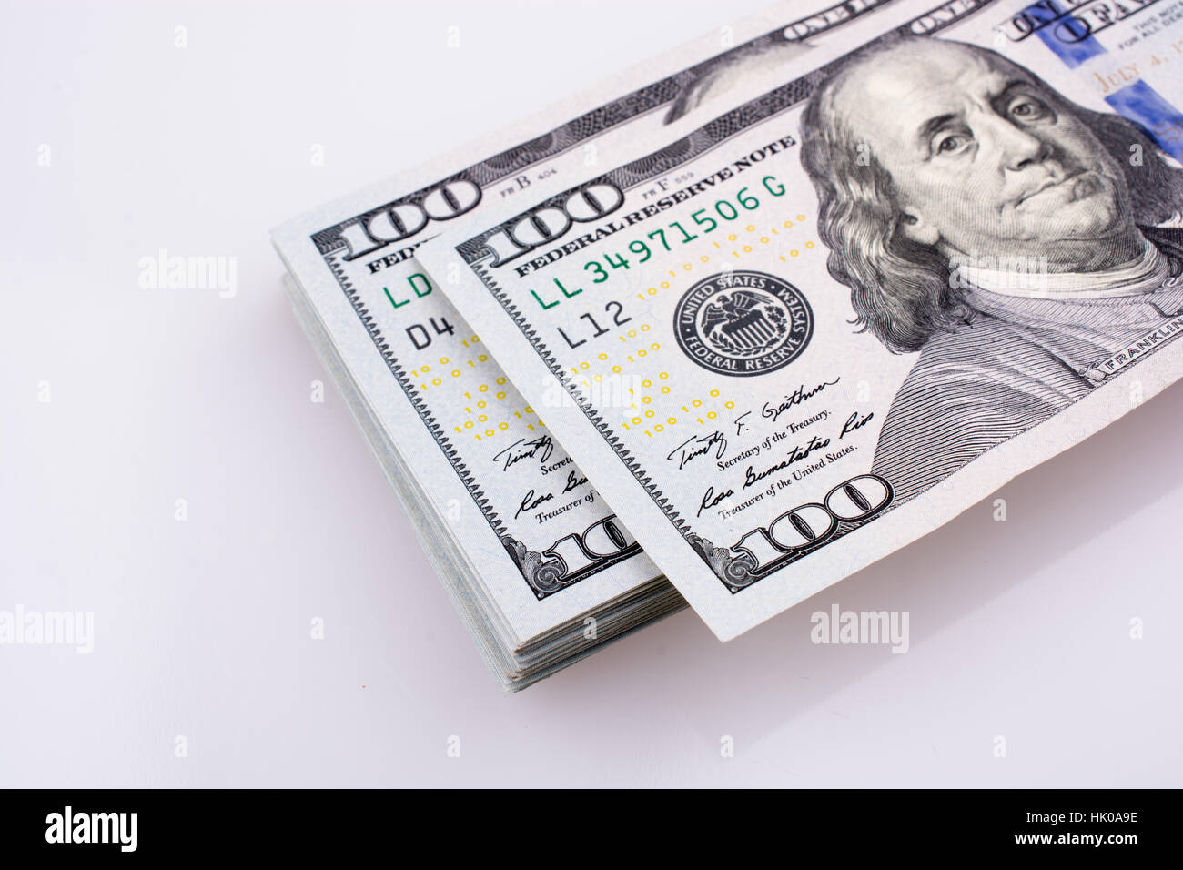 American 100 dollar banknotes made of paper placed on white background ...