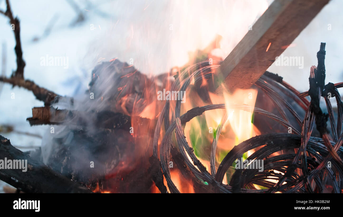 Firing wire in fire Stock Photo - Alamy