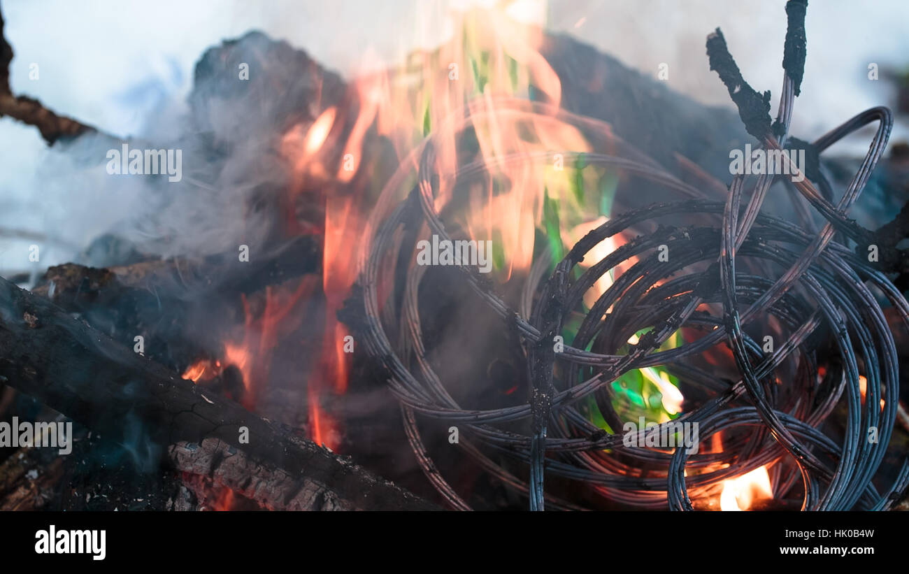 Firing wire in fire Stock Photo - Alamy