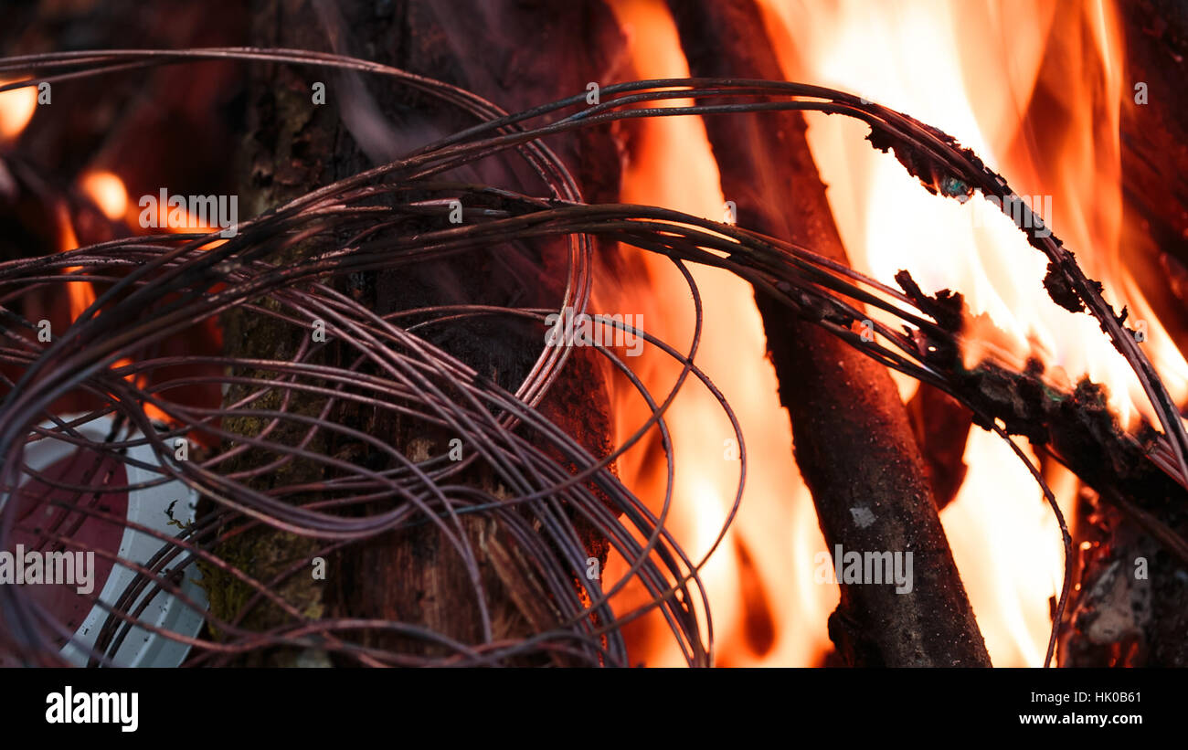 Firing wire in fire Stock Photo - Alamy