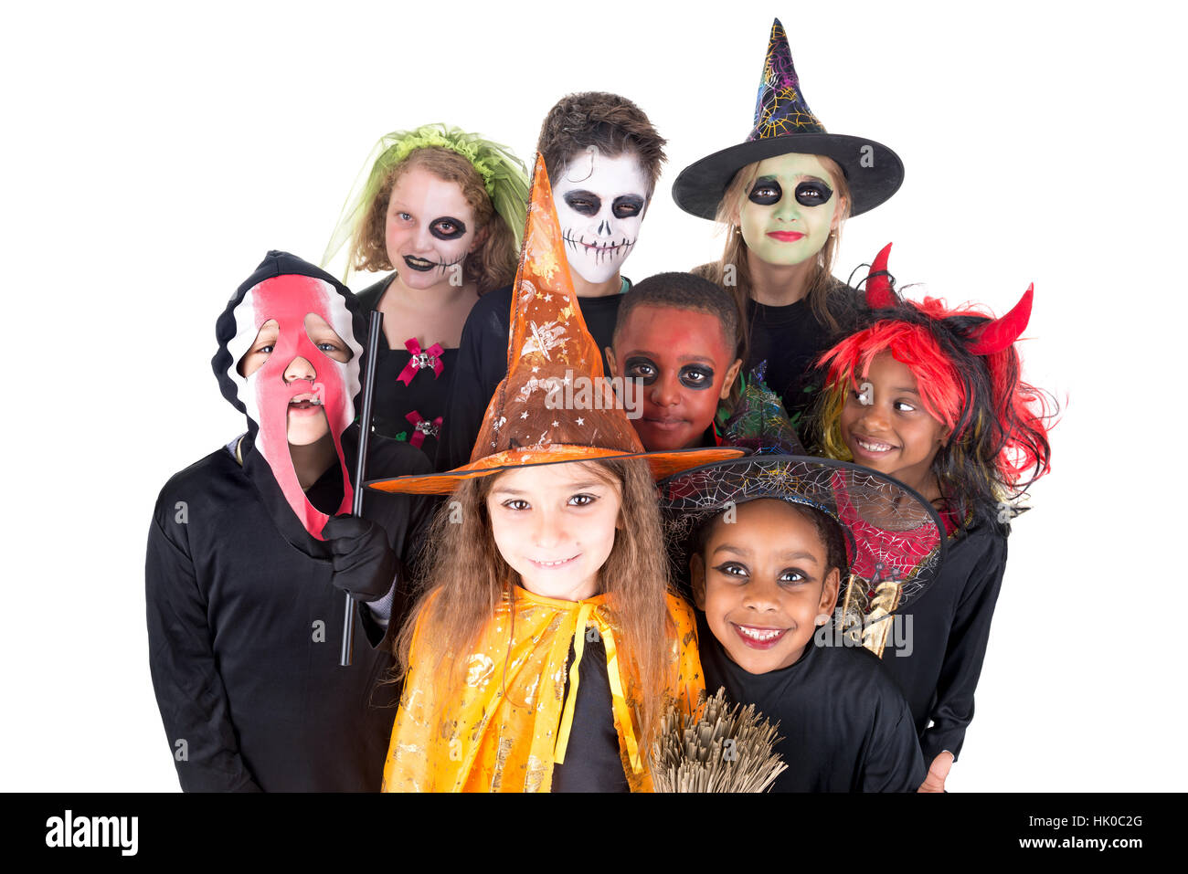 Kids with face-paint and Halloween costumes isolated in white Stock ...