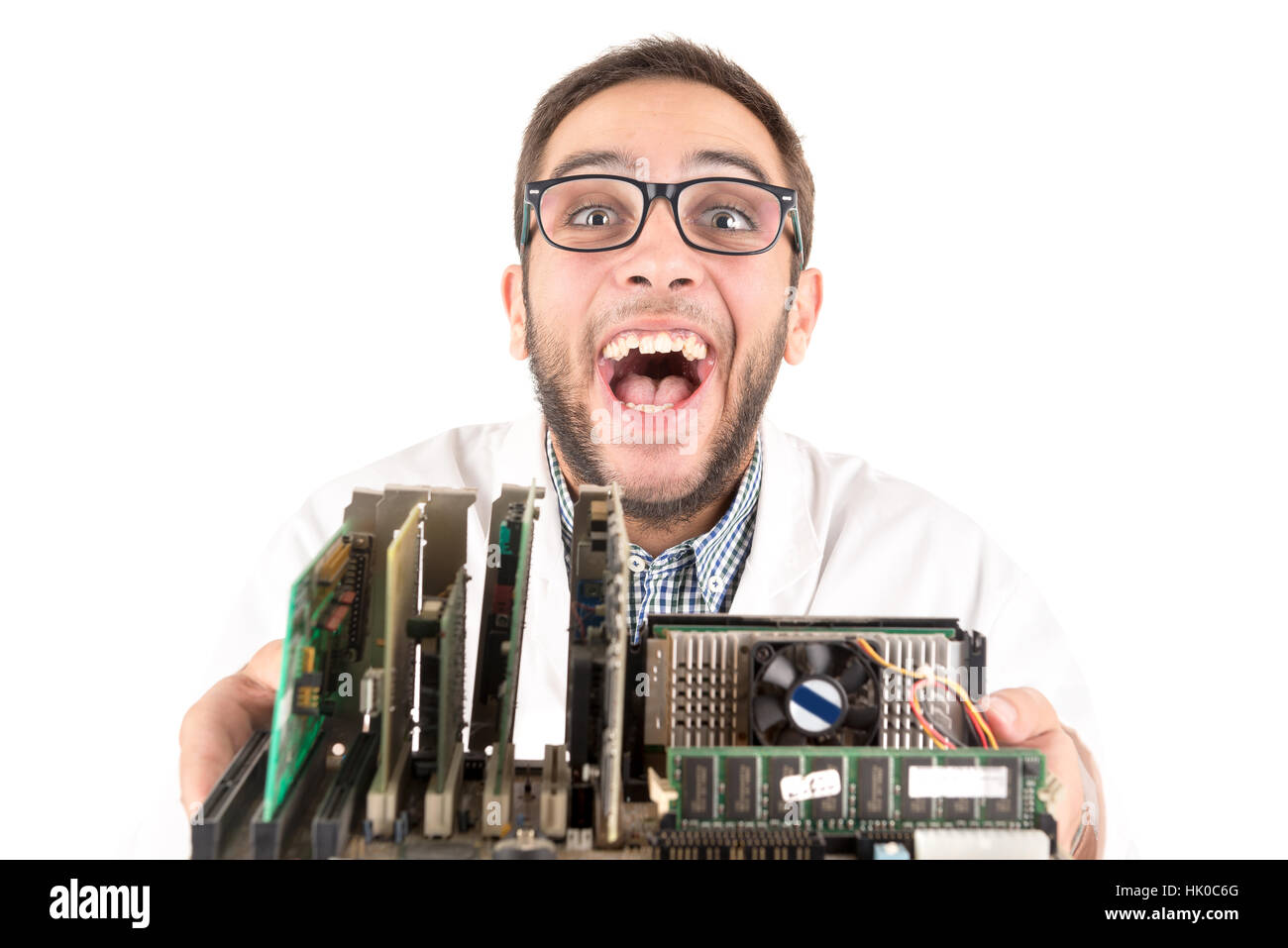 Nerd engineer posing with computer components isolated in a white ...