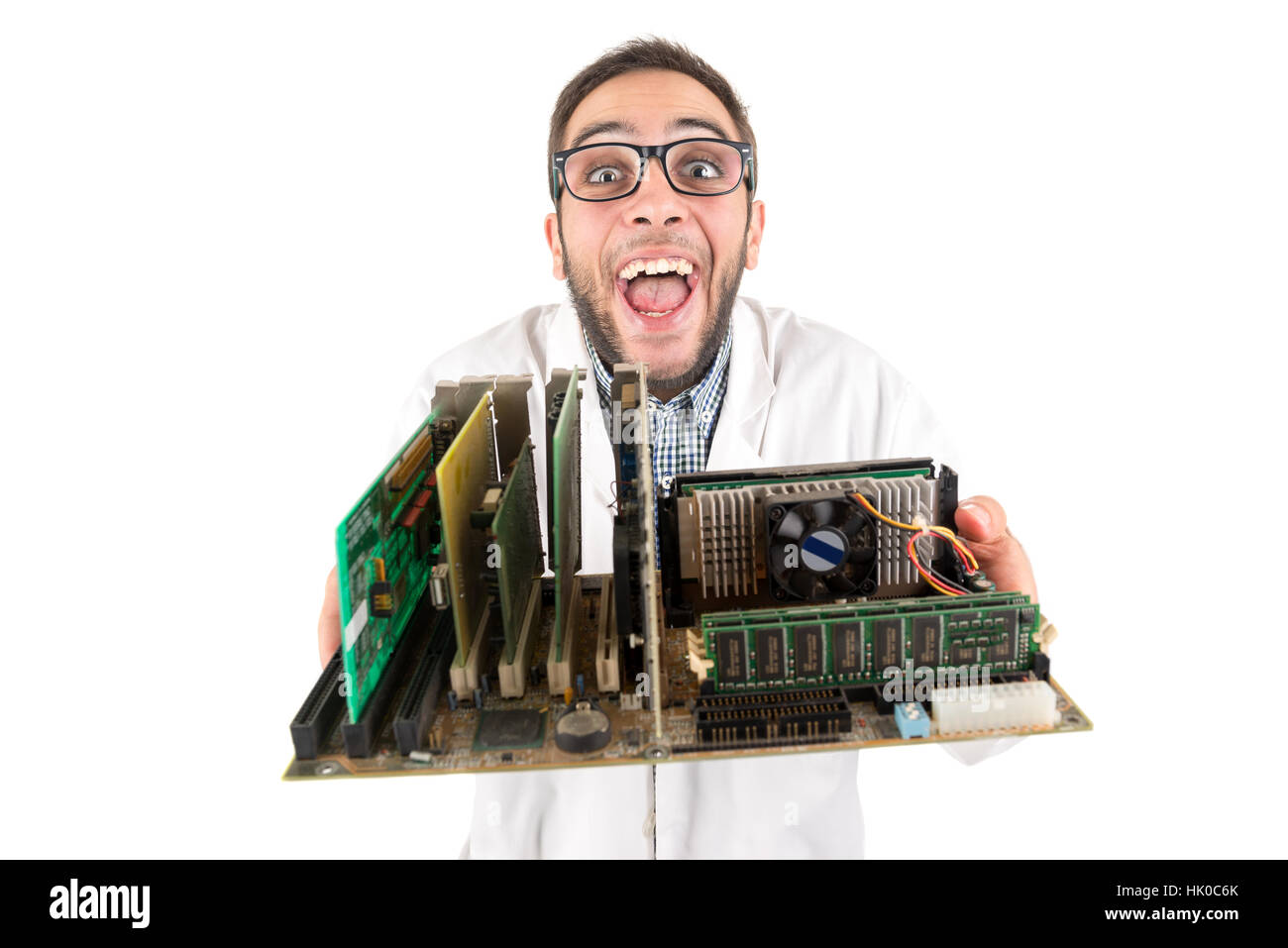 Nerd engineer posing with computer components isolated in a white ...