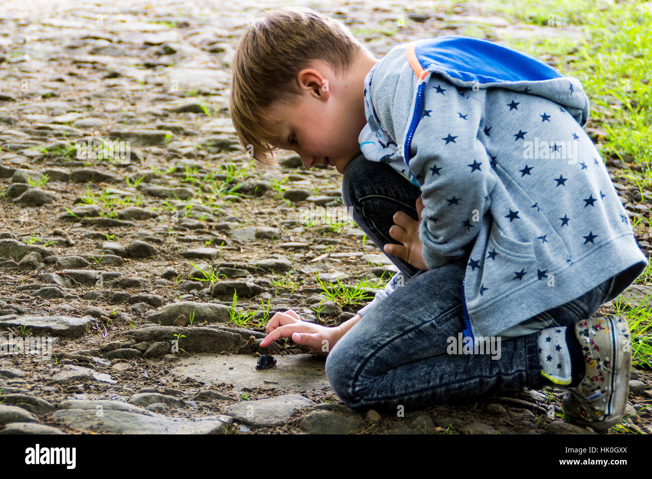 Curious child hi-res stock photography and images - Alamy