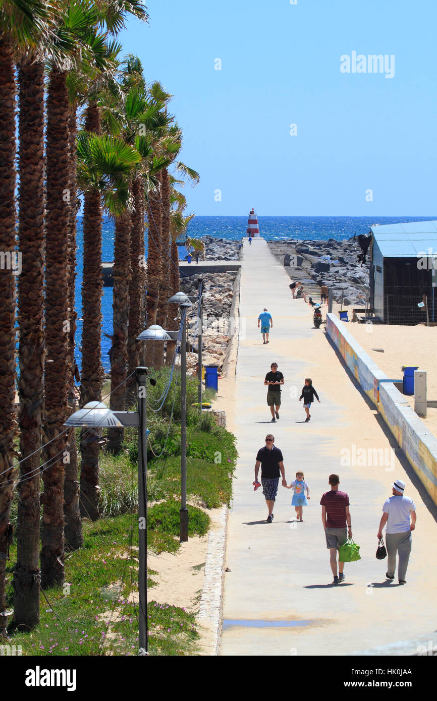 Portugal, Algarve, Portimao. People walking on the embankment Stock ...