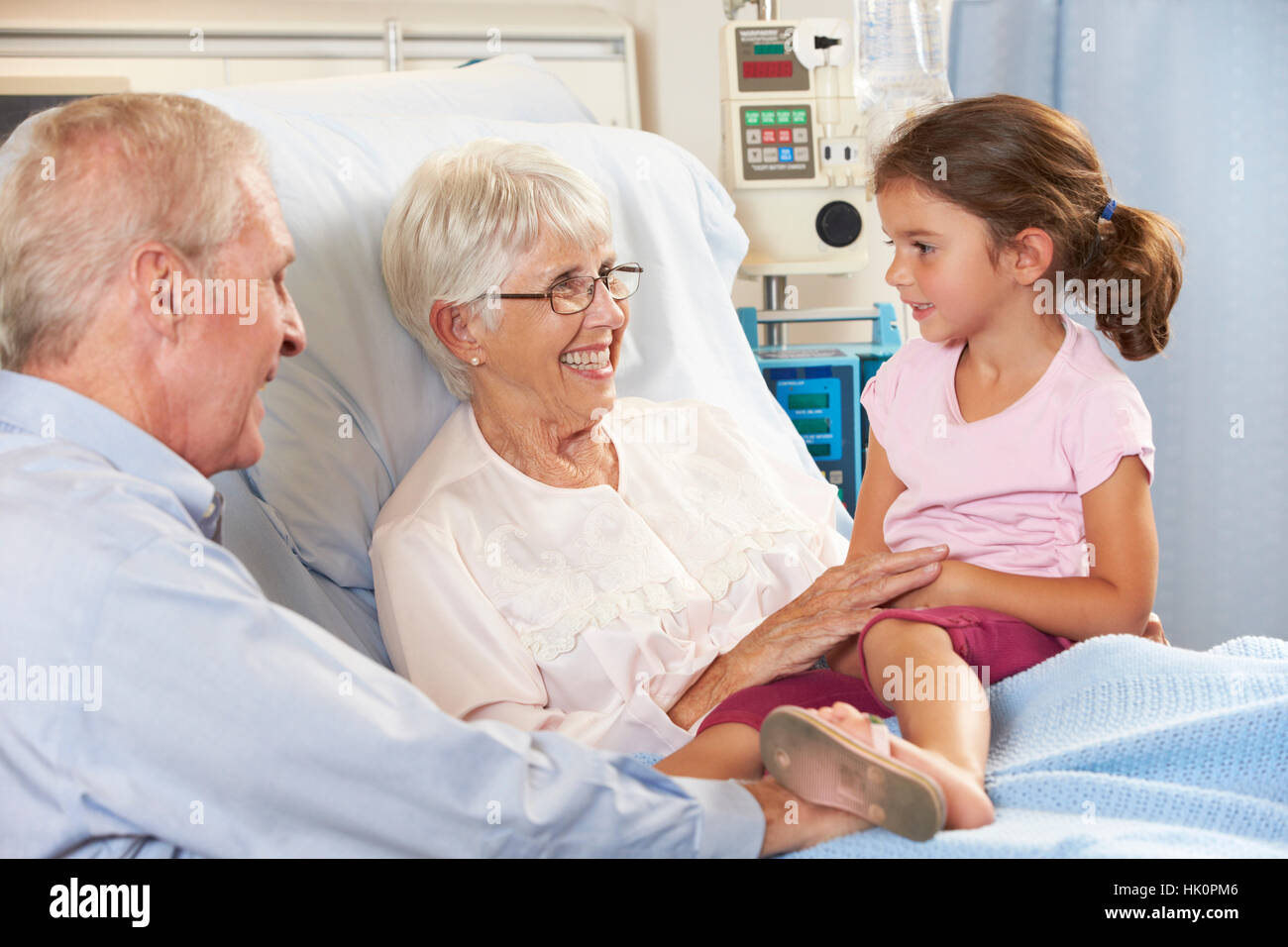 Granddaughter Visiting Grandmother In Hospital Bed Stock Photo - Alamy