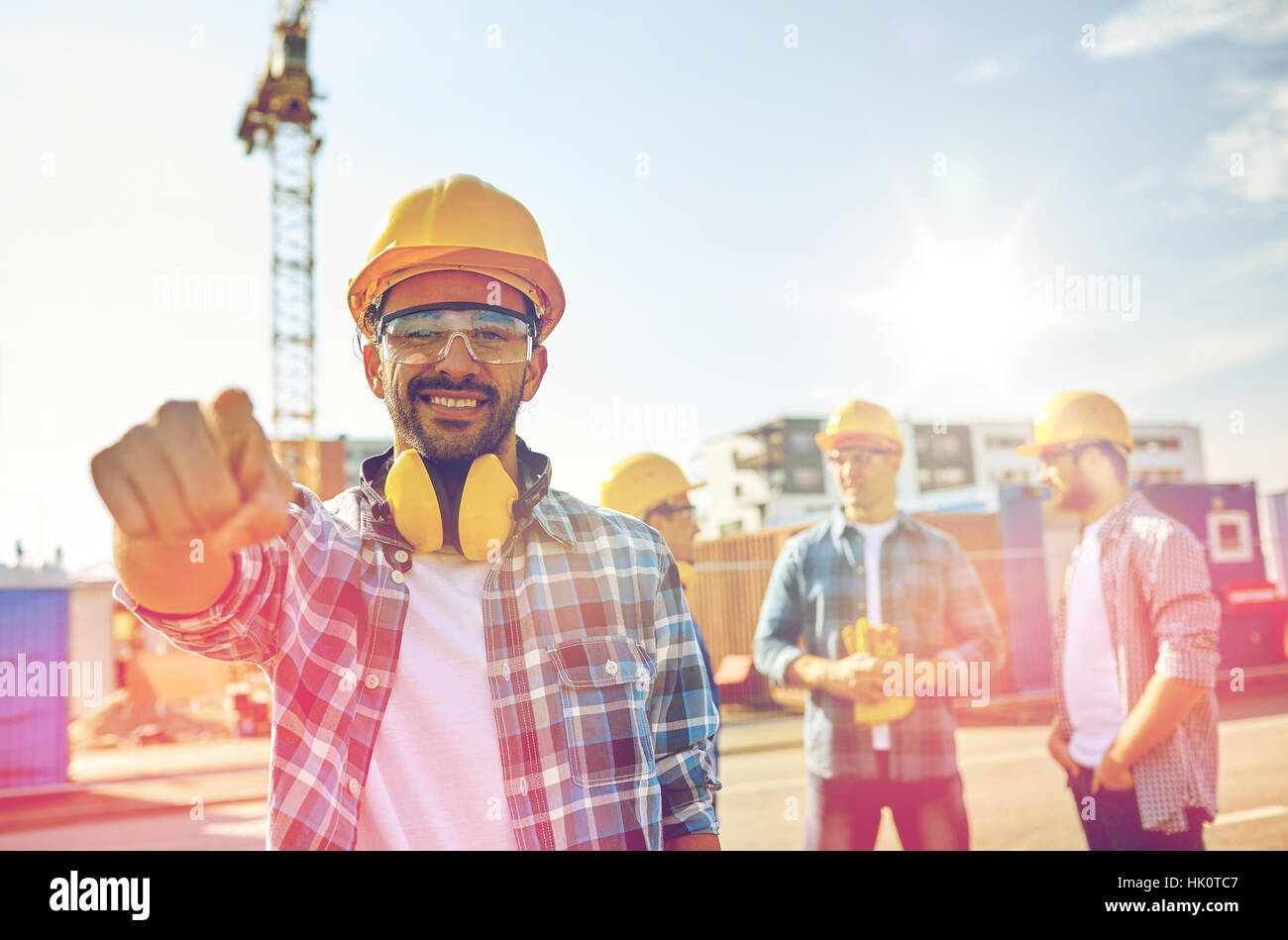 builders pointing finger at you on construction Stock Photo - Alamy