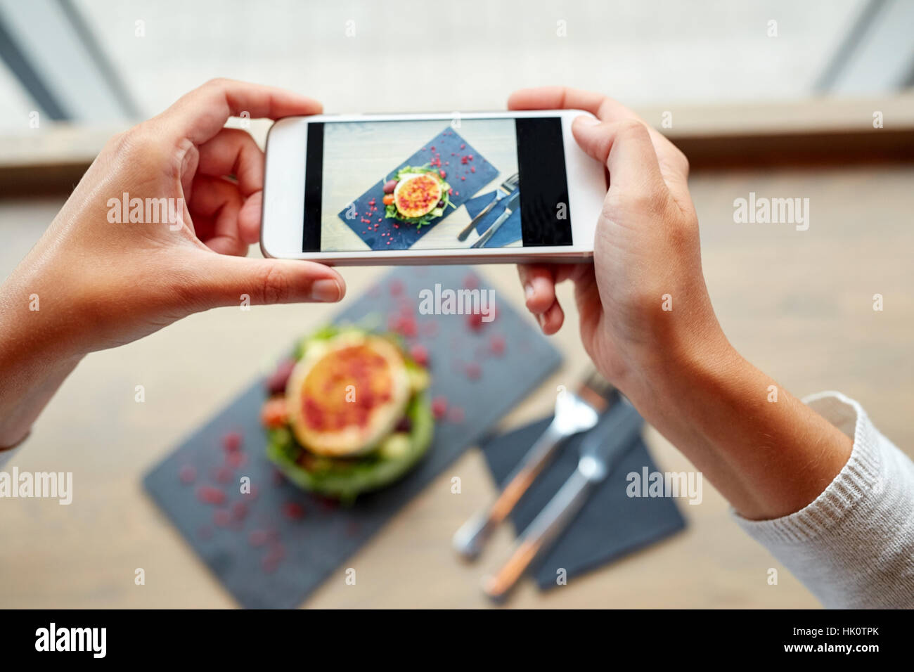 hands with smartphone photographing food Stock Photo - Alamy