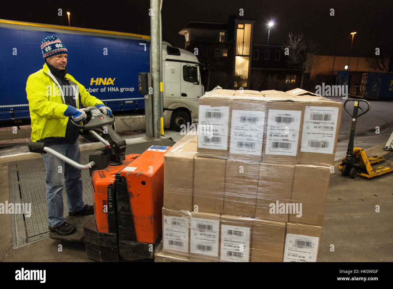 Loading a truck on the ramp Stock Photo - Alamy