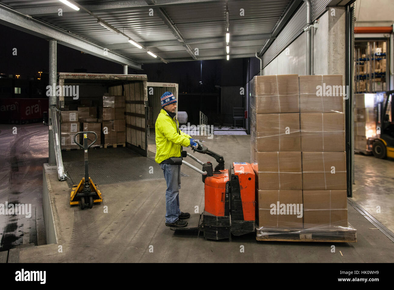Loading a truck on the ramp Stock Photo - Alamy