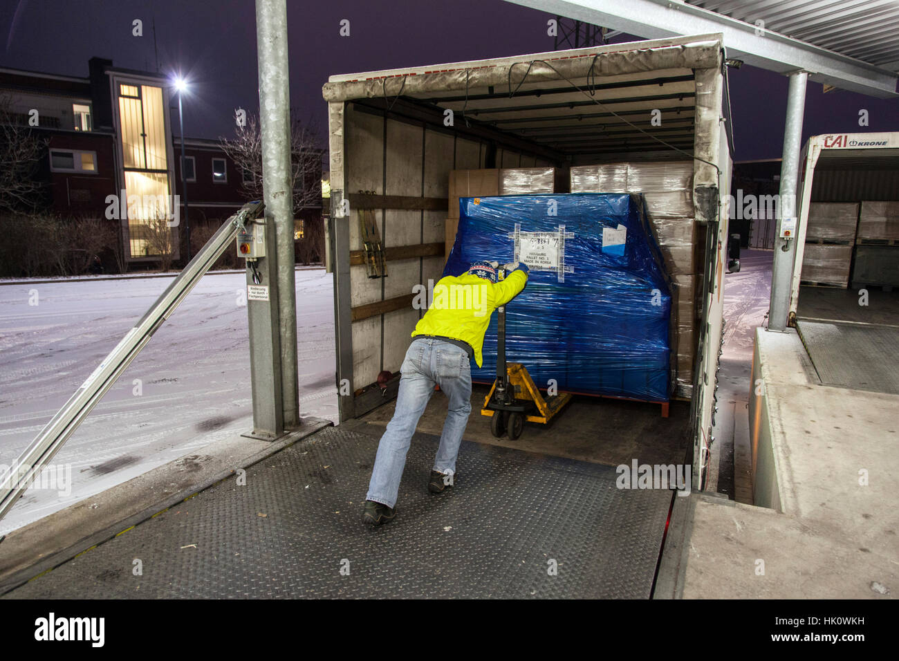 Loading a truck on the ramp Stock Photo - Alamy
