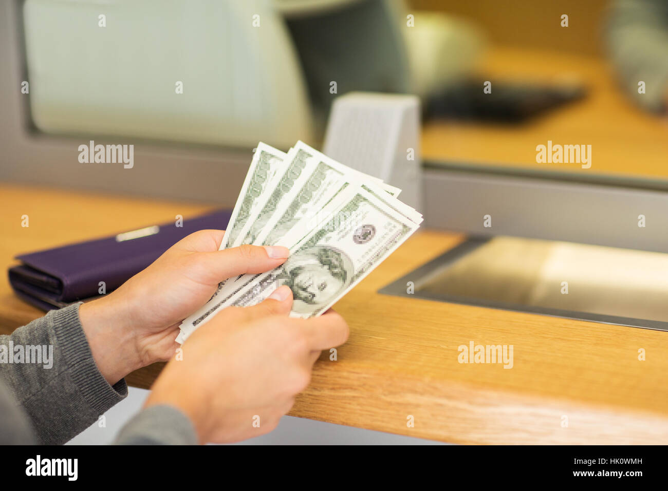 hands with money at bank or currency exchanger Stock Photo - Alamy