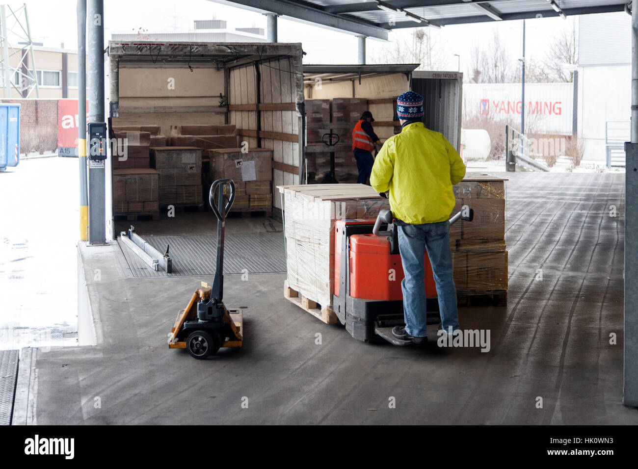 Loading a truck on the ramp Stock Photo - Alamy