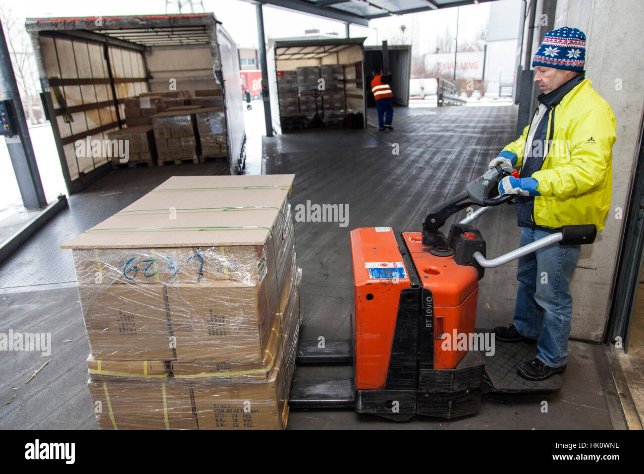 Loading a truck on the ramp Stock Photo - Alamy