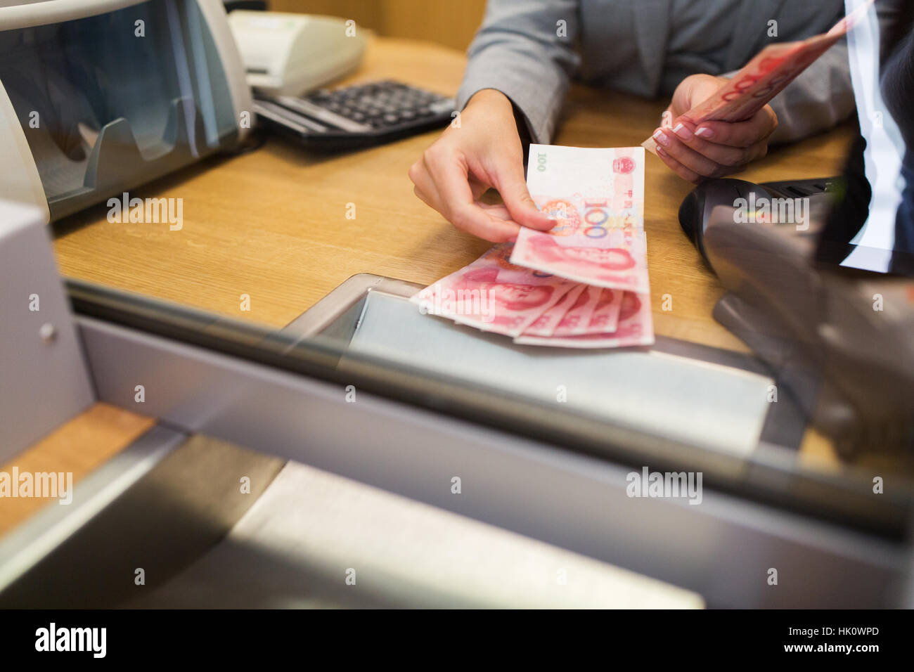 clerk counting cash money at bank office Stock Photo - Alamy