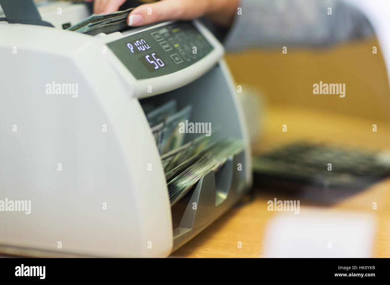 dollars in electronic money counter at bank office Stock Photo - Alamy