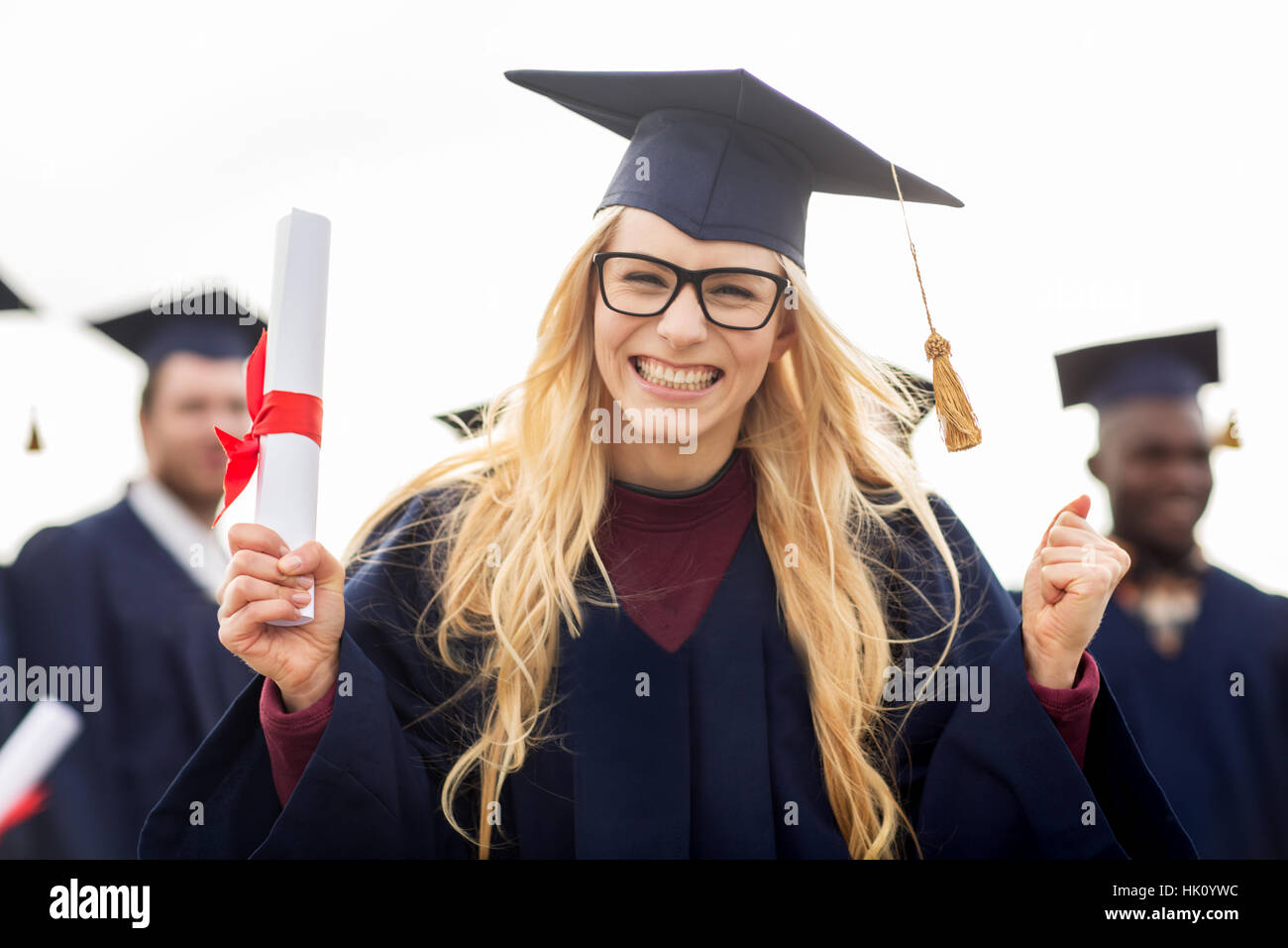 happy student with diploma celebrating graduation Stock Photo - Alamy