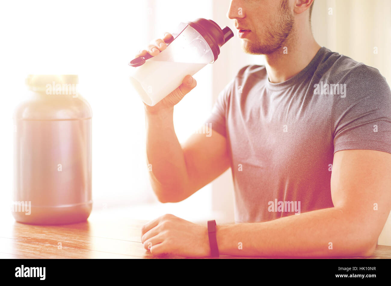 close up of man drinking protein shake Stock Photo - Alamy