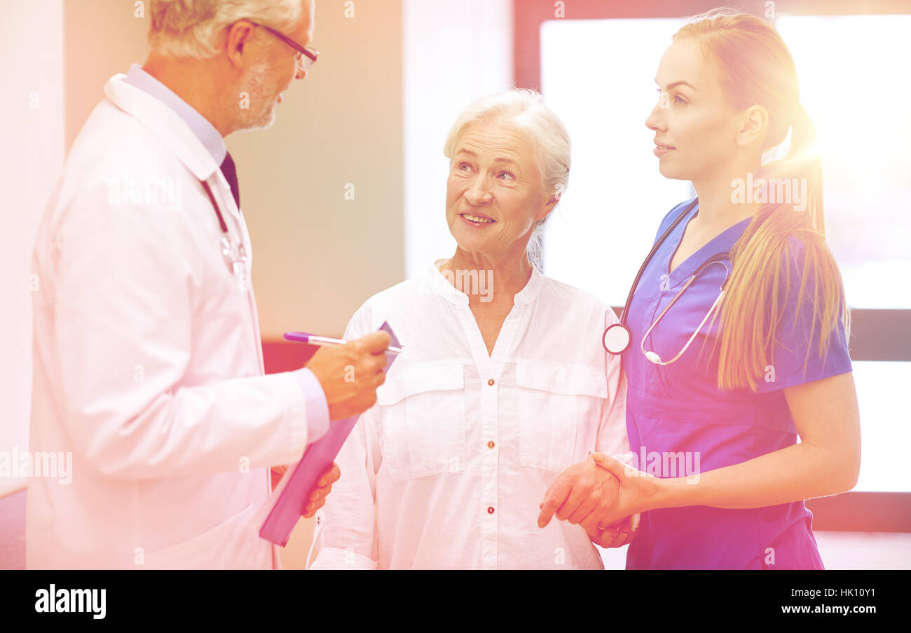 medics and senior patient woman at hospital Stock Photo - Alamy